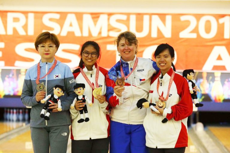 Adelia Naomi Yokoyama scores a gold while Kimberly Quek Hwee finishes ...